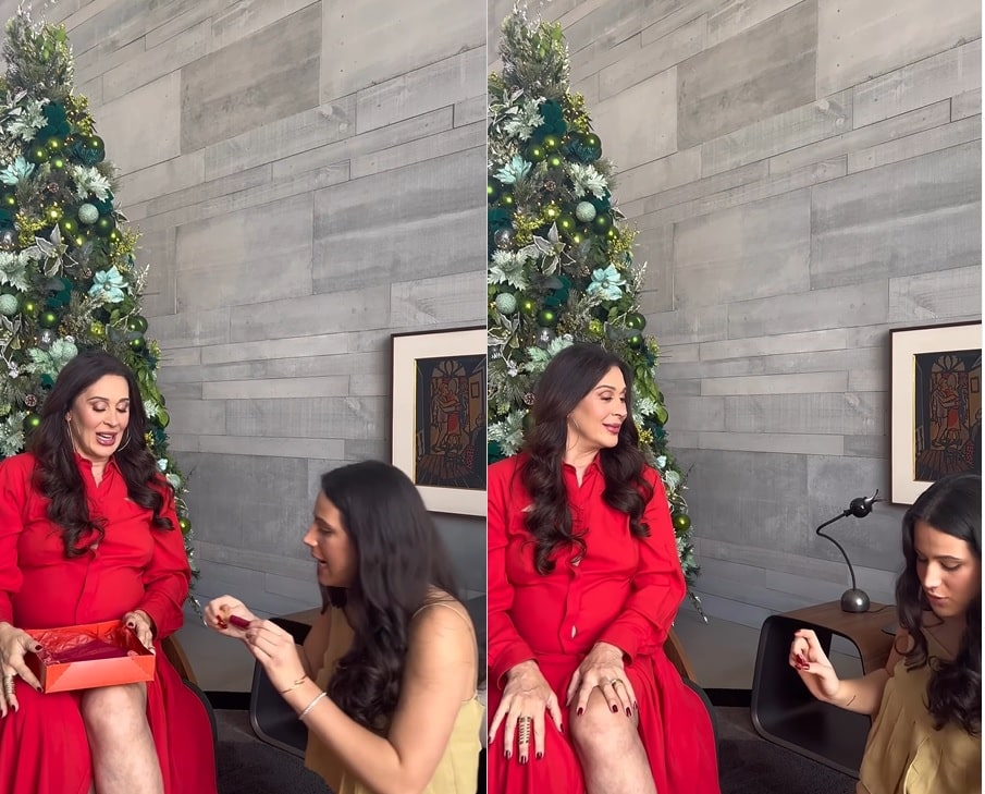 Grávida, Claudia Raia posa com a filha em árvore de Natal gigante